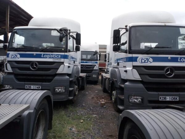 Buzeki shows off new fleet of trucks, shrugs claim he is broke