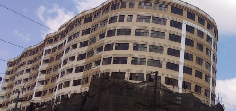 Photos: Net finally removed from landmark OTC building after years ...